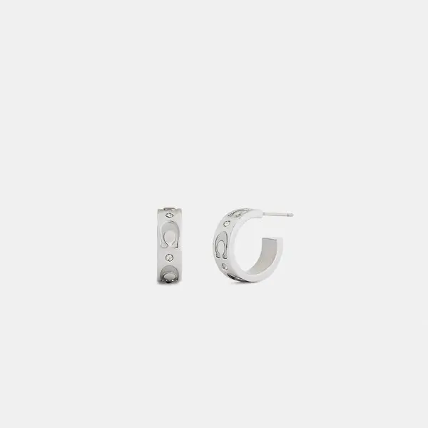 COACH Repeated C Huggie Earrings - Silver