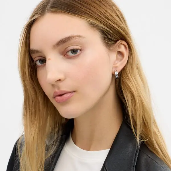 COACH Repeated C Huggie Earrings