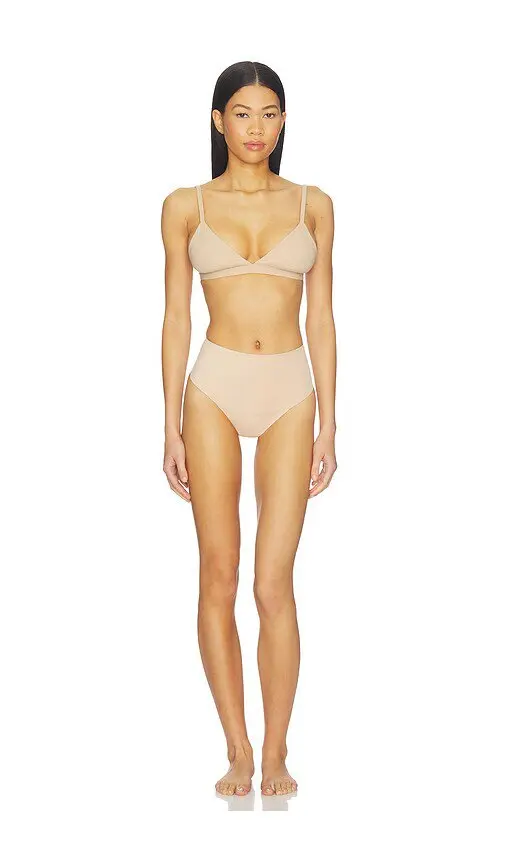 SKIMS Smoothing Intimates High-waisted Thong In Tan