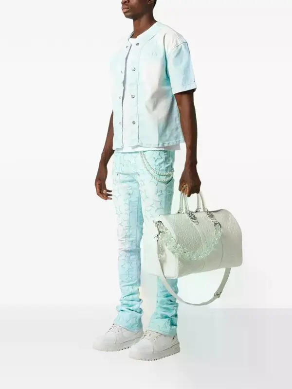 GUAPI Embossed Duffle Bag With Chain Detail
