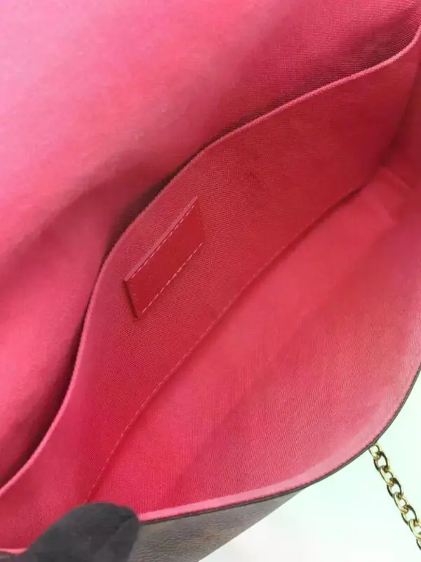 LOUIS VUITTON 2021-2026 Monogram Christmas Animation Vivienne Holywood Pochette Felicie - Brown