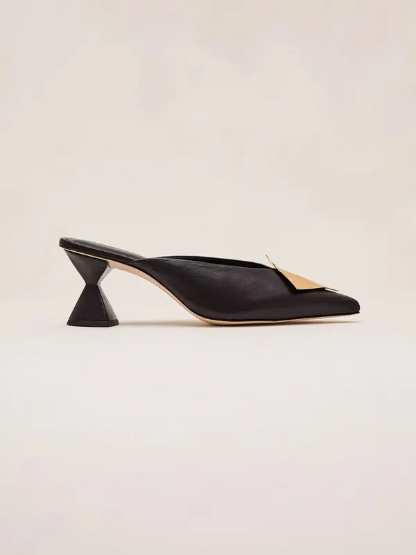 Alexis Madeline Mule With Sculptural Heel And Metal Accent