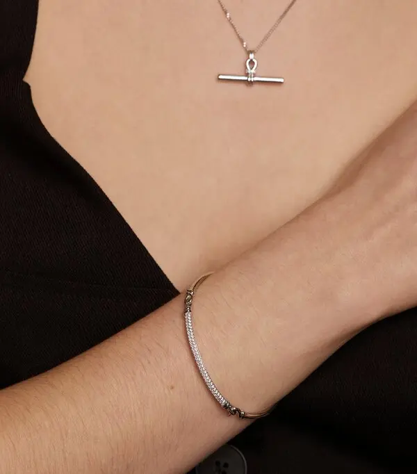 ASTRID & MIYU Rhodium-plated Pavé Knot Bangle - Silver