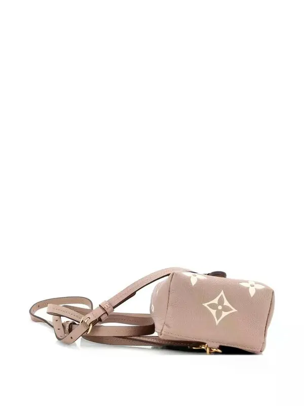 LOUIS VUITTON Tiny Bicolor Monogram Empreinte Giant Backpack
