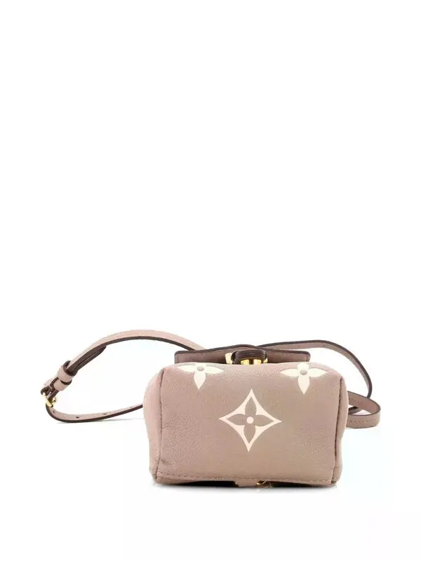 LOUIS VUITTON Tiny Bicolor Monogram Empreinte Giant Backpack