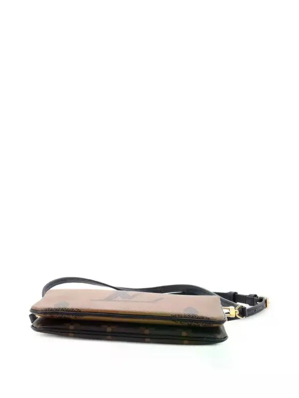 LOUIS VUITTON Double Zip Pochette Reverse Monogram Giant Clutch - Brown