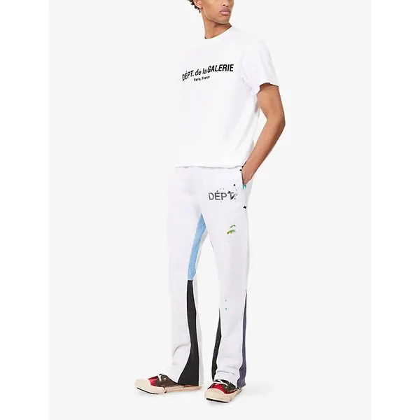 GALLERY DEPT. Paint-splattered Logo-print Cotton Jogging Bottoms