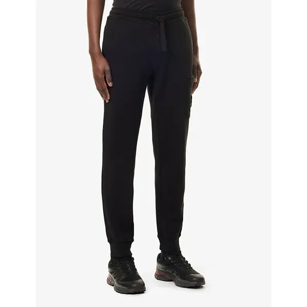 Stone Island Brand-badge Tapered-leg Regular-fit Cotton-jersey Jogging Bottoms - Black