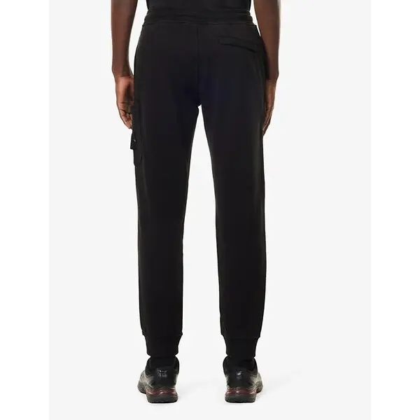 Stone Island Brand-badge Tapered-leg Regular-fit Cotton-jersey Jogging Bottoms - Black