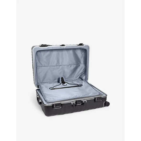 Tumi Extended Trip Four-wheel Shell Checked Suitcase