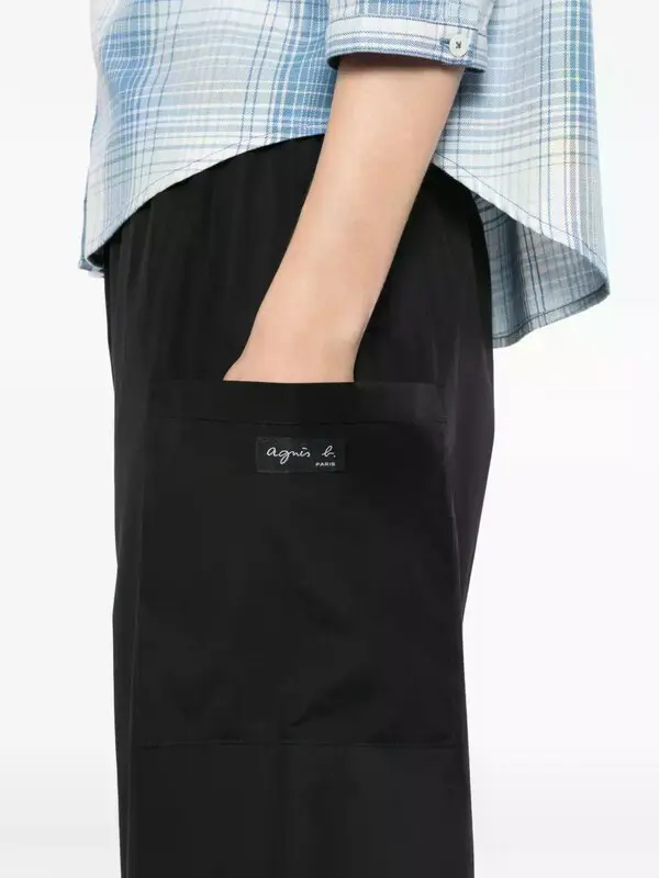 AGNES B. High-waisted Trousers