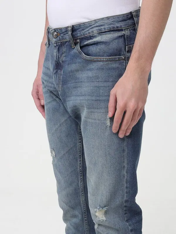 Versace Distressed Denim Jeans