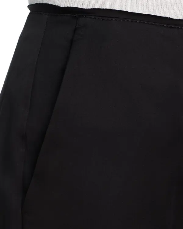 TOTEME Kick Flare Raw Edge Trousers - Black