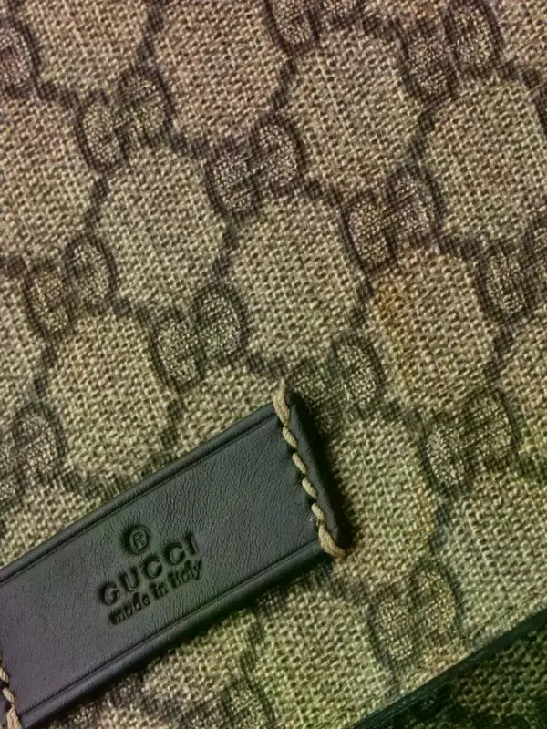 Gucci Gg Coated Canvas Crossbody Bag - Brown