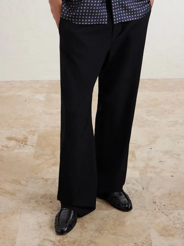 Saint Laurent Collapsible-heel Logo-embellished Eel Loafers - Black