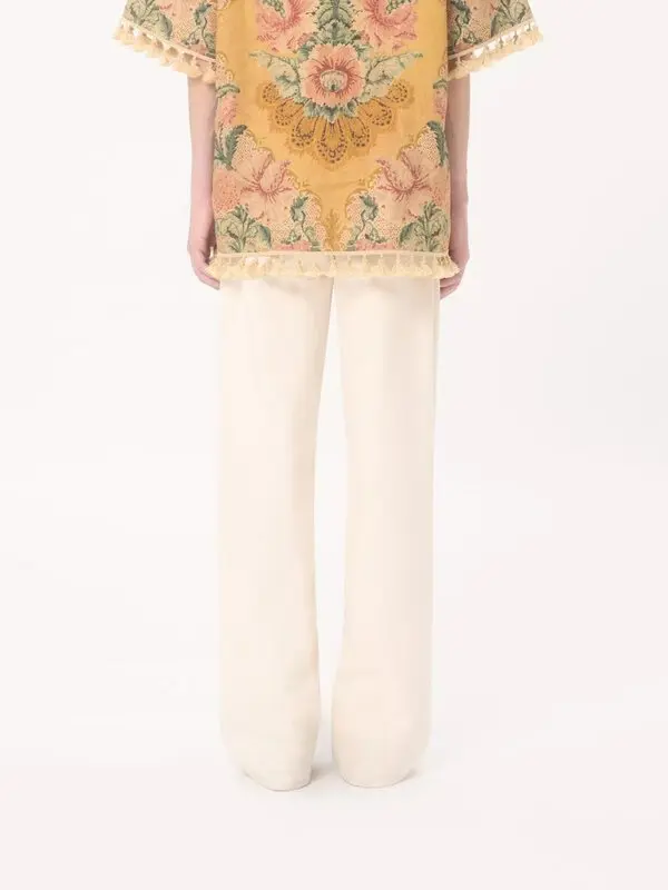 Valentino Garavani Loose-fit Denim Trousers - Cream