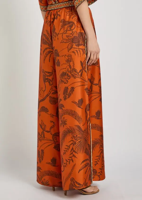ALEMAIS Alémais Monkey Dance Printed Wide-leg Silk Trousers - Rust