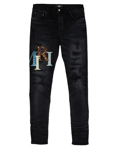 Amiri Skinny Jeans With Leather Trims