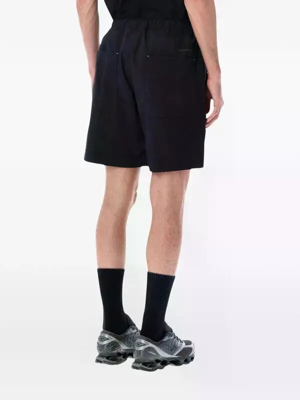 AND WANDER Pleat-detail Shorts
