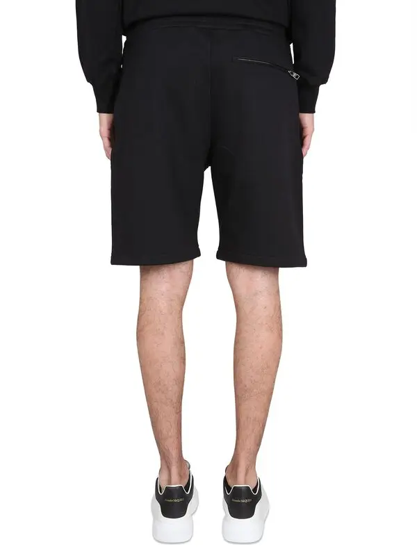 Alexander McQueen Bermuda Shorts With Graffiti Logo Print - Black