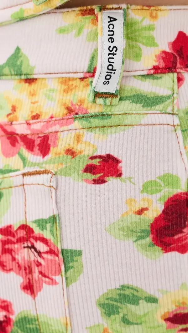 Acne Studios Floral Print Ribbed Stretch Trousers With Ruffled Hem - Pink/multi