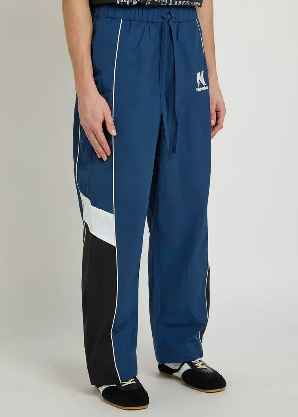 NAHMIAS Warm Up Panelled Shell Track Pants - Blue
