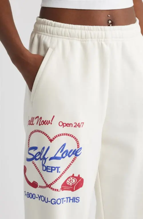 THE MAYFAIR GROUP Self Love Club Oversize Fleece Graphic Sweatpants