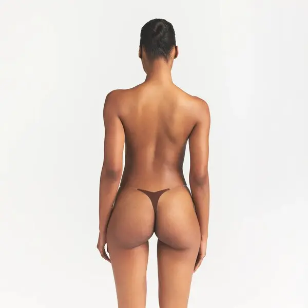 SKIMS Clear Strap String Thong | Deep Neutral | Large | Invisible - Cocoa
