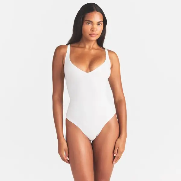 SKIMS Unlined Plunge Thong Bodysuit - Ivory