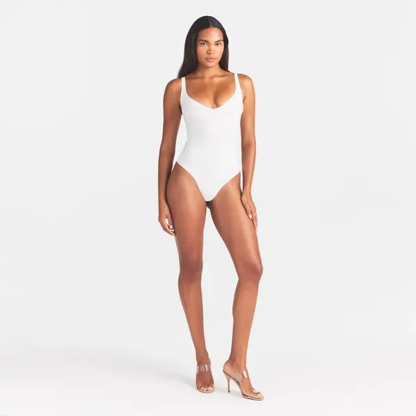 SKIMS Unlined Plunge Thong Bodysuit - Ivory