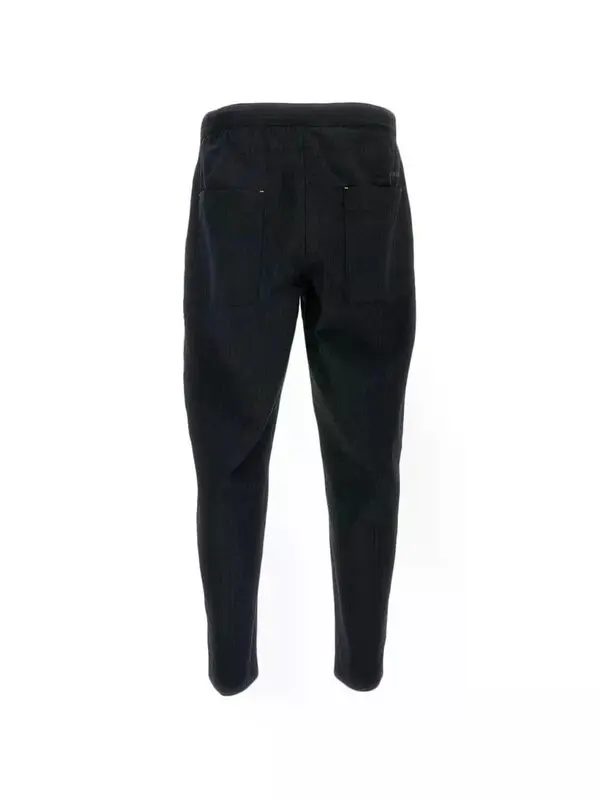 AND WANDER Belted Pleated Trousers