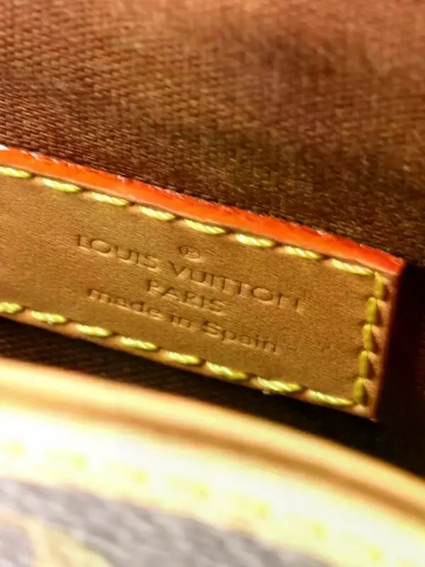 LOUIS VUITTON Fold Me Pouch Monogram Canvas - Brown