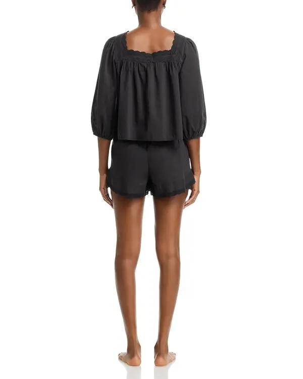 The Great. The Eyelet Button Sleep Top - Black