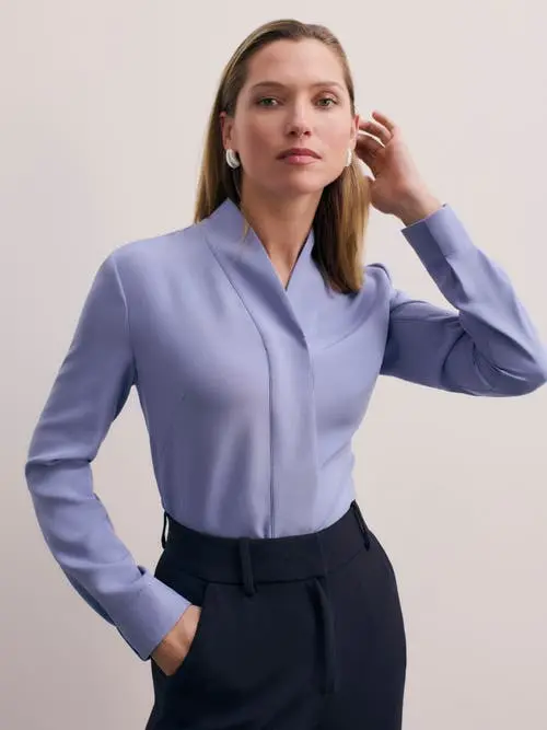 The Fold Bowery Sleeveless V-neck Blouse - Blue