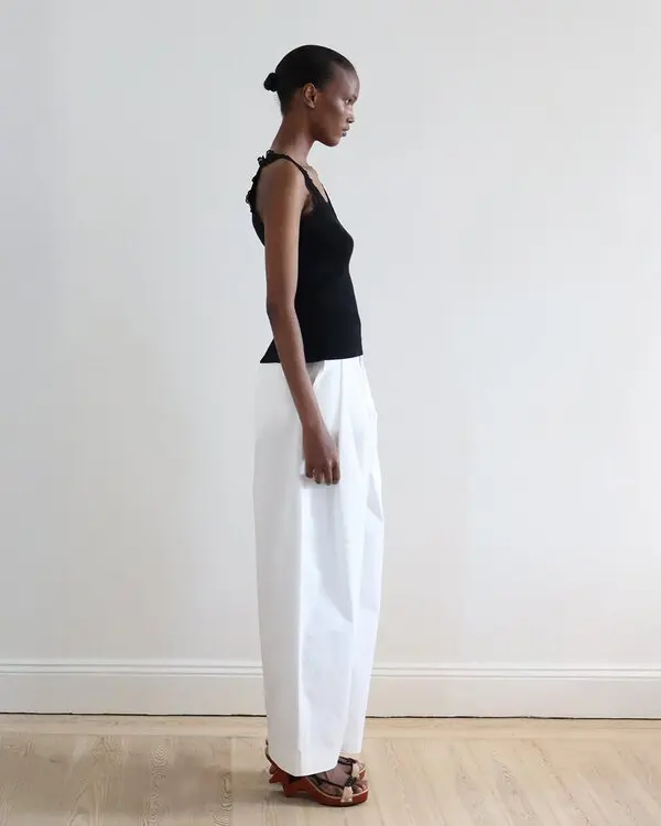 LEONÍ Lma Lace-trimmed Ribbed Silk Top
