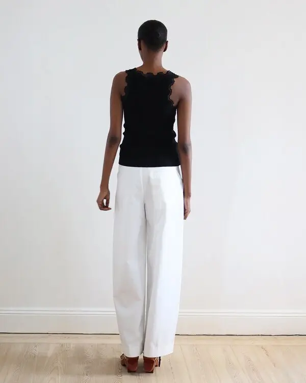 LEONÍ Lma Lace-trimmed Ribbed Silk Top