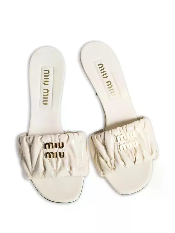 Miu Miu Matelassé Patent Nappa Leather Mules - Neutrals