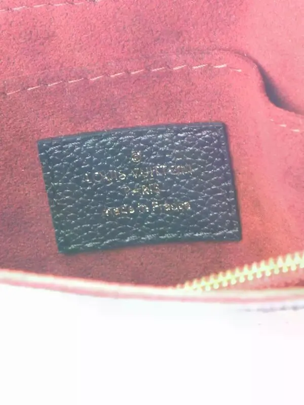 LOUIS VUITTON Madeleine Handbag Bicolor Monogram Empreinte Giant Bb - Black