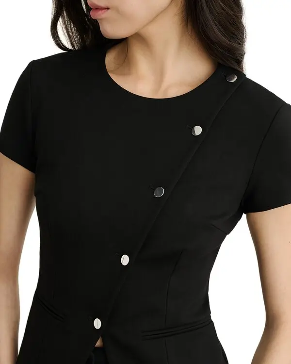 TOCCIN Maude Asymmetric Top