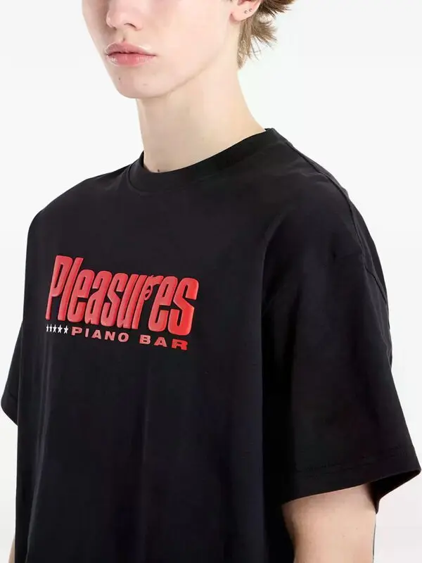PLEASURES Piano Bar T-shirt