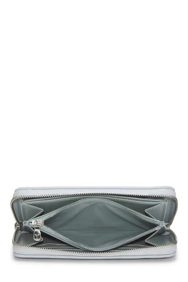 LOUIS VUITTON Monogram Embossed Zippy Continental - Blue