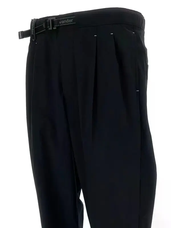 AND WANDER Uv-cut Pleated Trousers