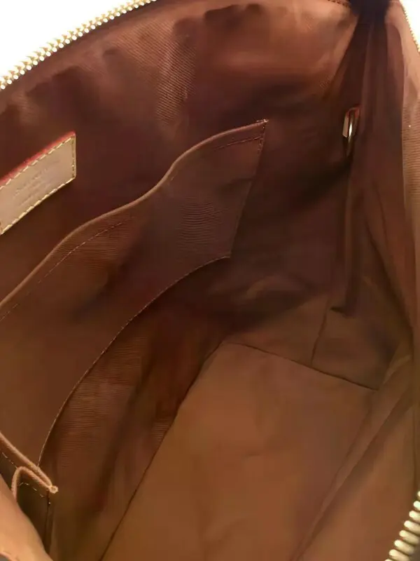 LOUIS VUITTON 2001 Lockit Vertical Monogram Bucket Bag