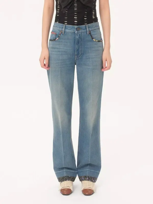 Valentino Garavani Medium Denim Trousers With Floral Detail - Blue