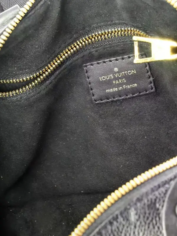 LOUIS VUITTON Petite Malle Souple Monogram Empreinte Leather - Black