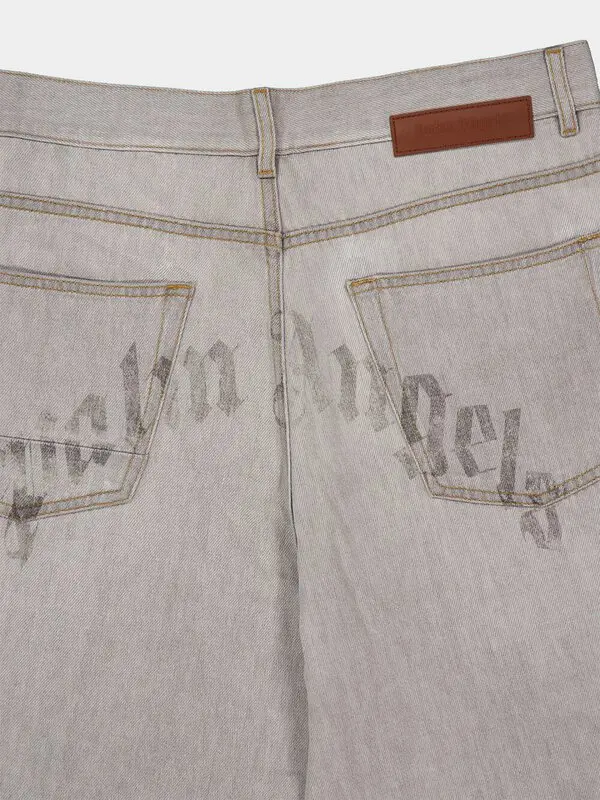 Palm Angels Light Loose Fit Jeans With Curved Logo