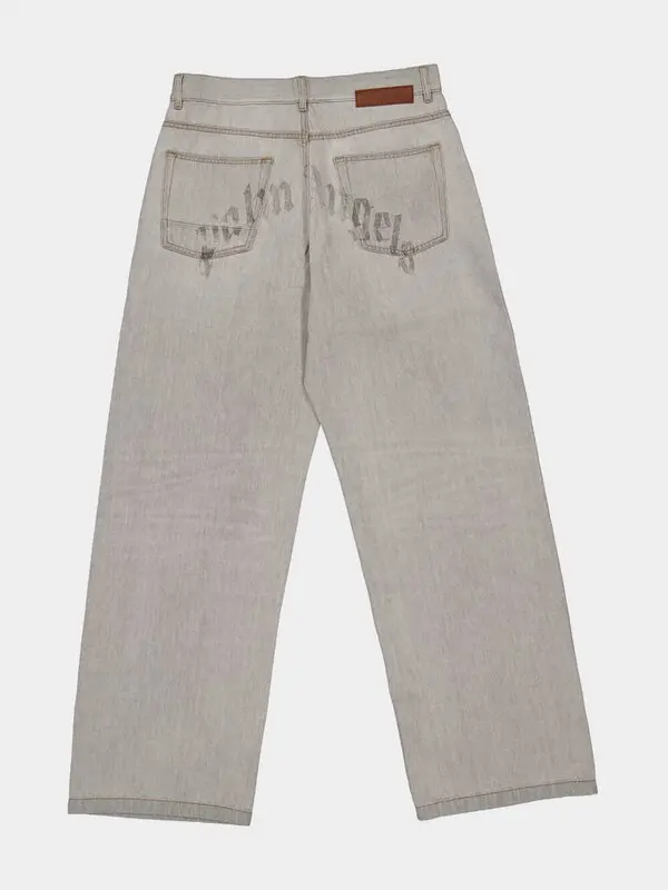 Palm Angels Light Loose Fit Jeans With Curved Logo