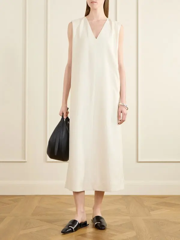 Tory Burch Pierced Embellished Leather Slip-ons