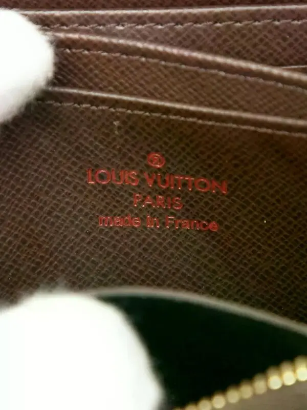 LOUIS VUITTON 2009 Damier Ebene Zippy Purse Coin Pouch