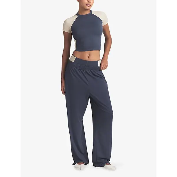 NIKESKIMS Matte Shine Cropped Baby Tee Training Top